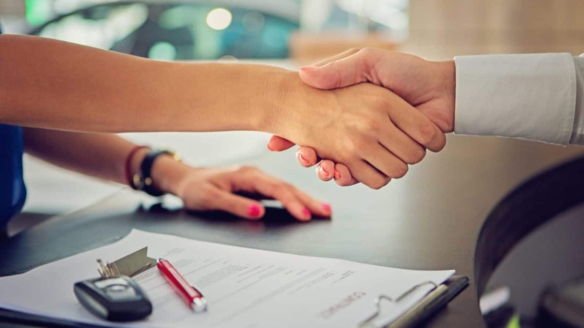 Individual Leasing A Vehicle From A Car Dealer Stock Photo | Lewis ...